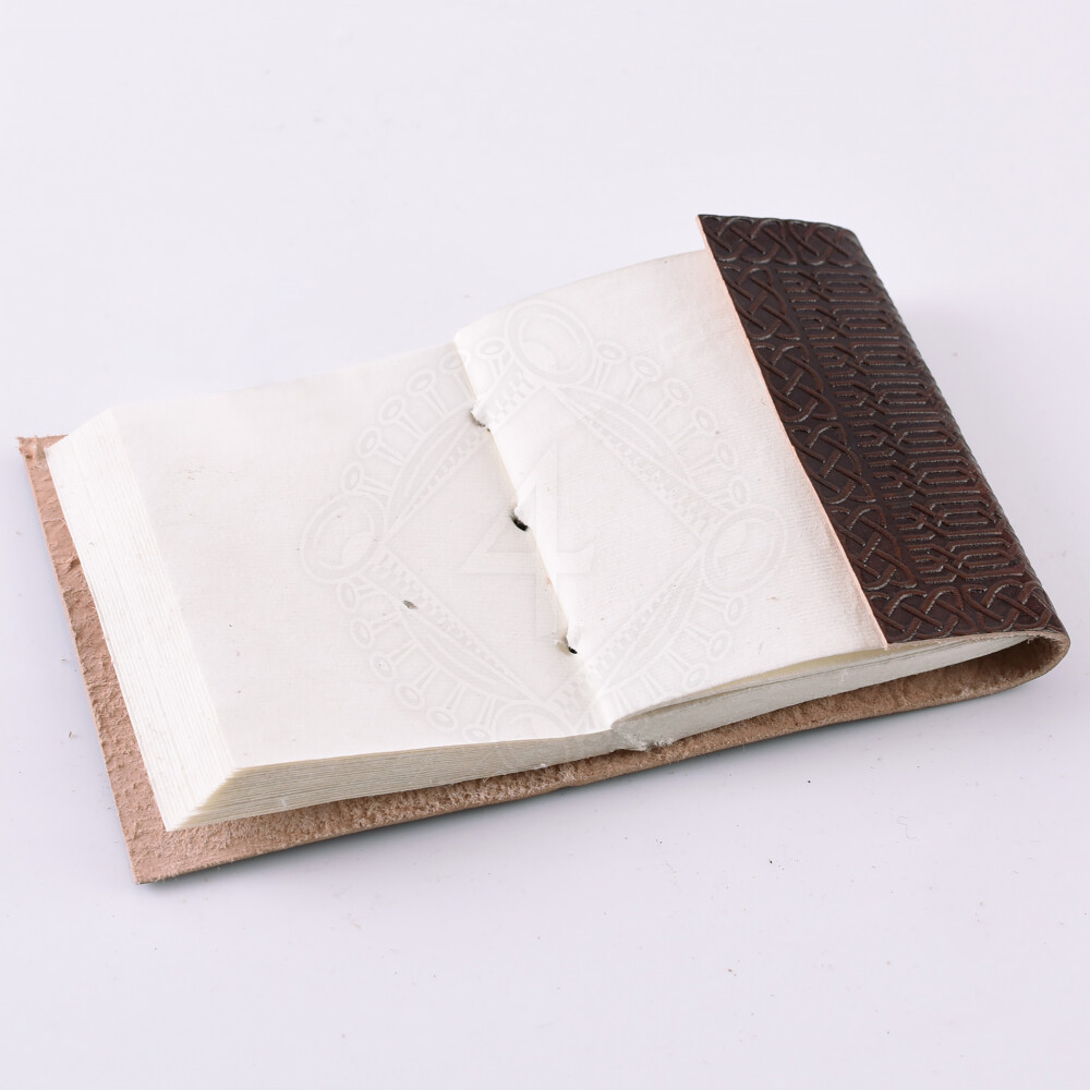 Small pocketbook with Celtic sun embossed in leather cover, 9x7cm ...